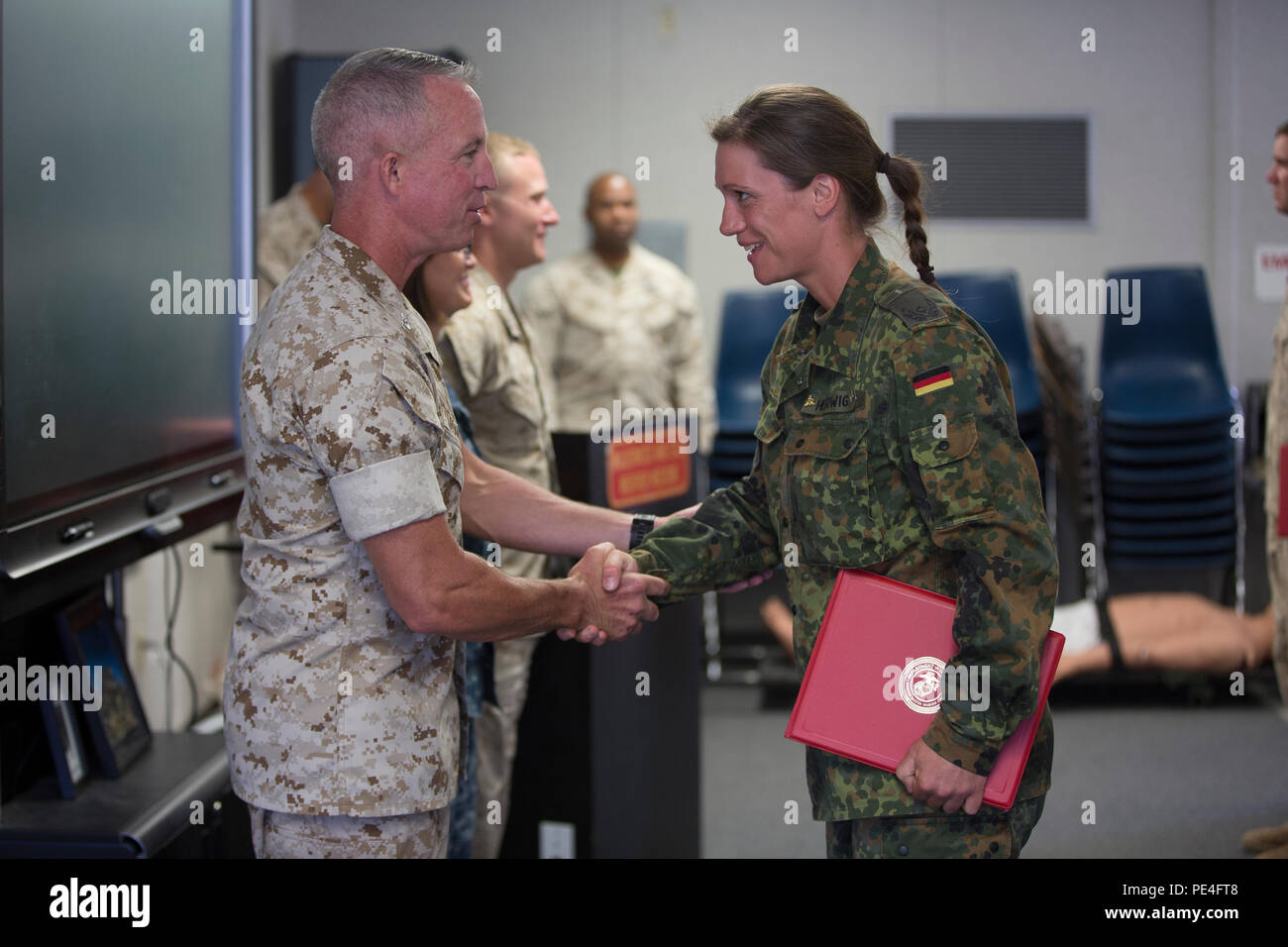 U.S. Marine Corps Col. Scott D. Leonard, right, commanding officer ...