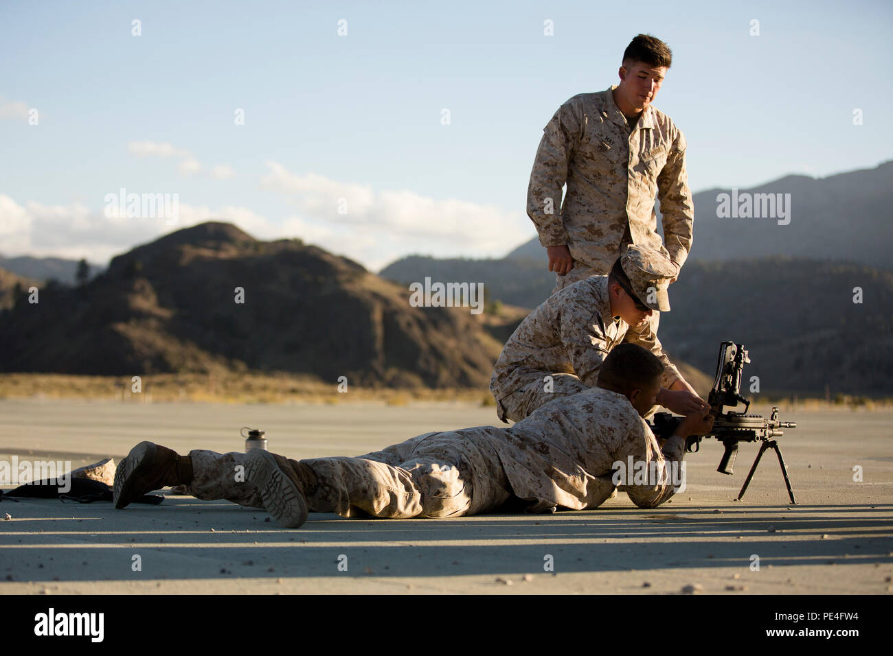 U.S. Marine Corps Lance Cpl. Justin P. Ruff, bottom left, automatic ...