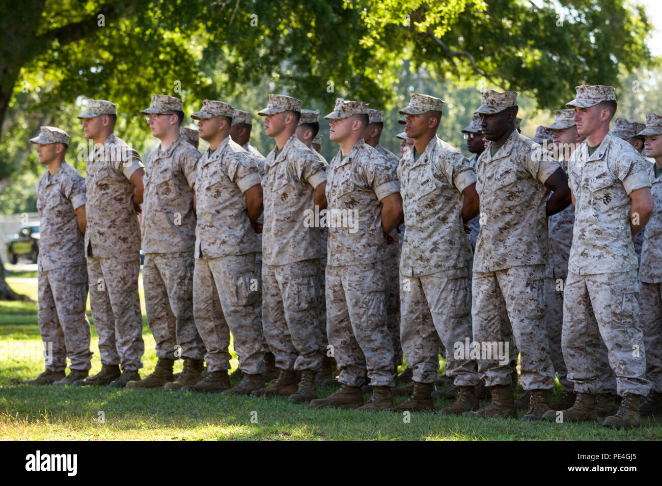 U.S. Marines with the 26th Marine Expeditionary Unit (MEU), stand in ...
