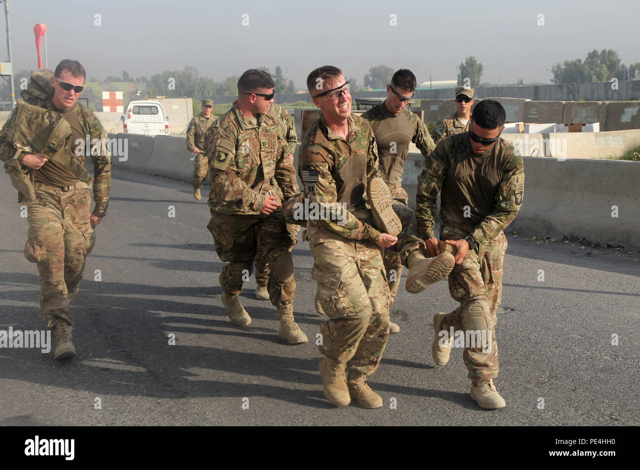 3rd BCT, 101st Airborne Division officers evacuate a simulated casualty ...