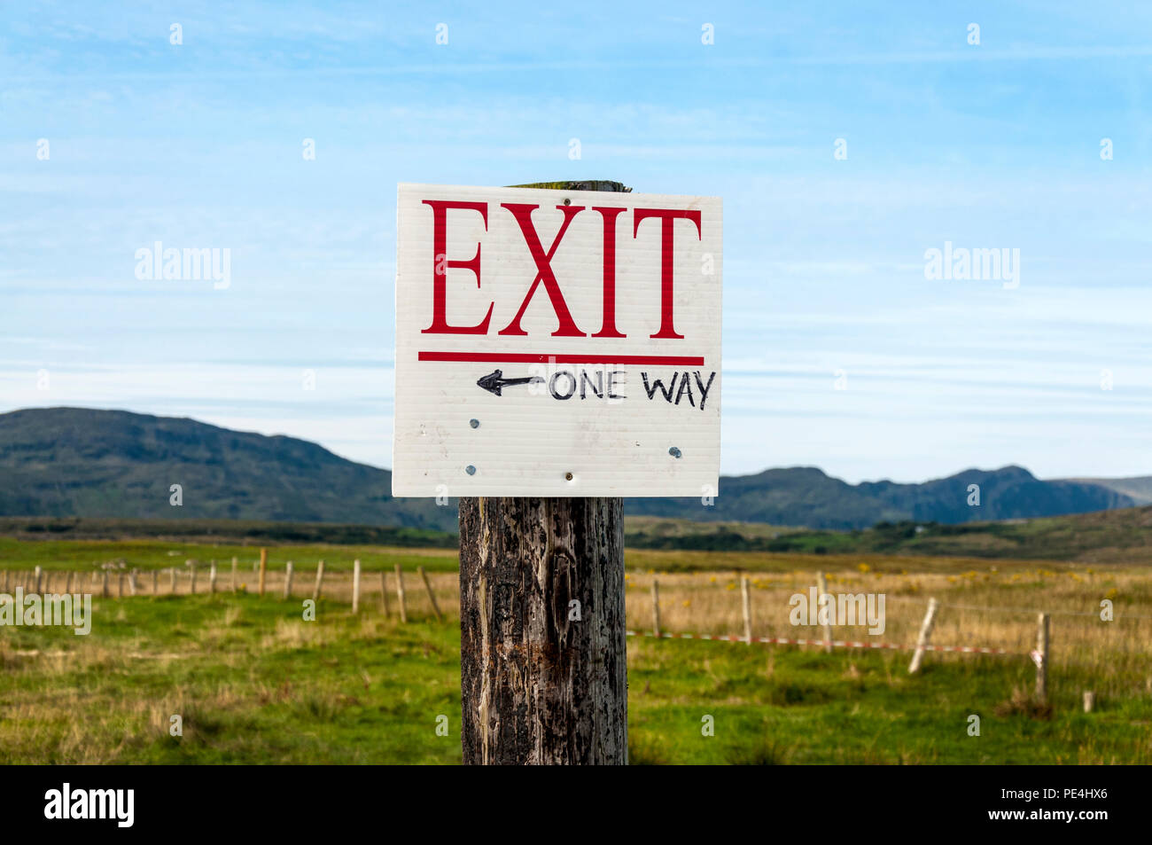 Exit one way sign signage Stock Photo - Alamy