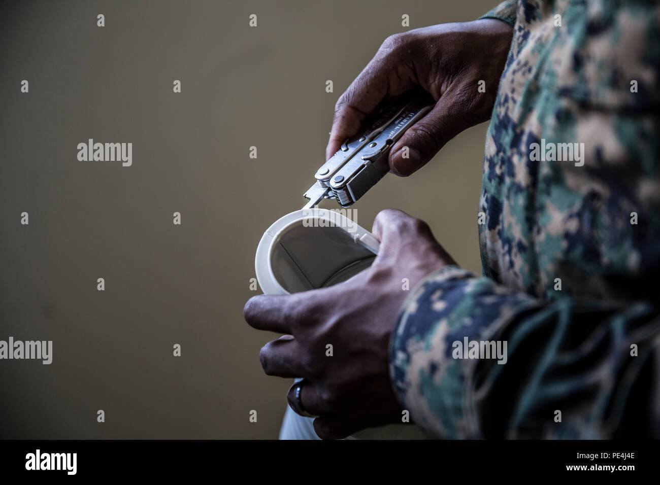 U.S. Marine Corps GySgt. Edwin Jean-Francois, a civil affairs chief ...