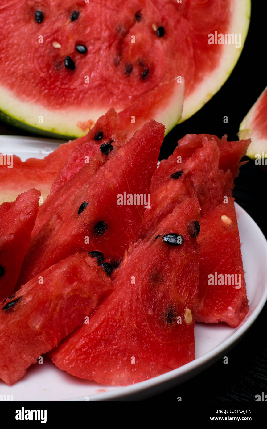 raw red watermelon and watermelon slices, fresh fruit Stock Photo - Alamy