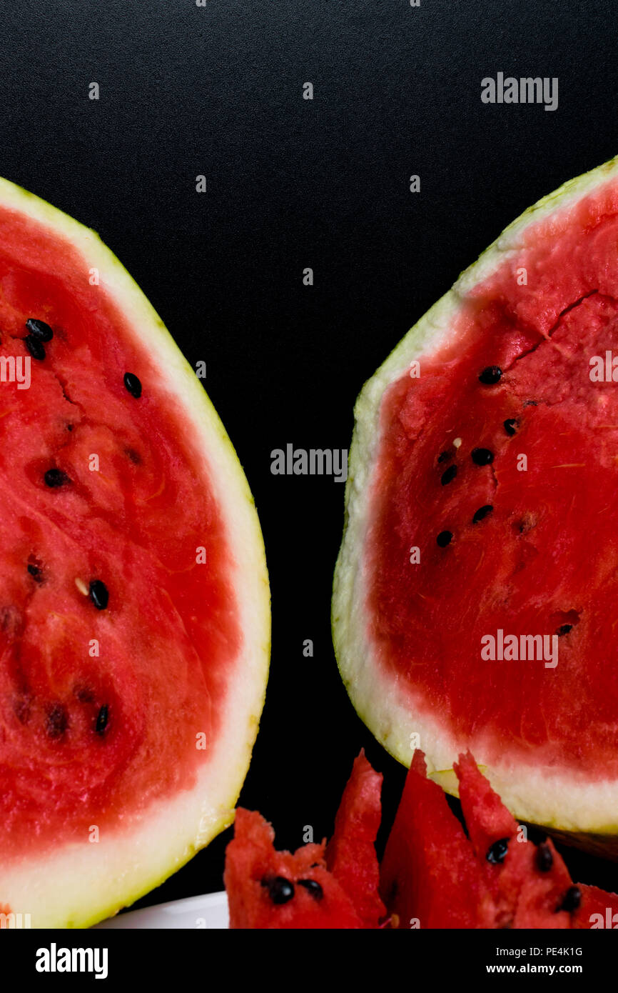 raw red watermelon and watermelon slices, fresh fruit Stock Photo - Alamy