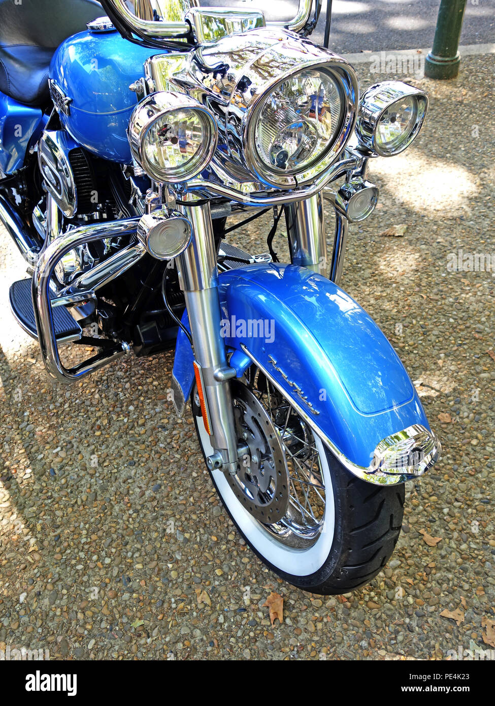 Side view of a blue Harley-Davidson FLHRC Road King Motorbike, showing ...