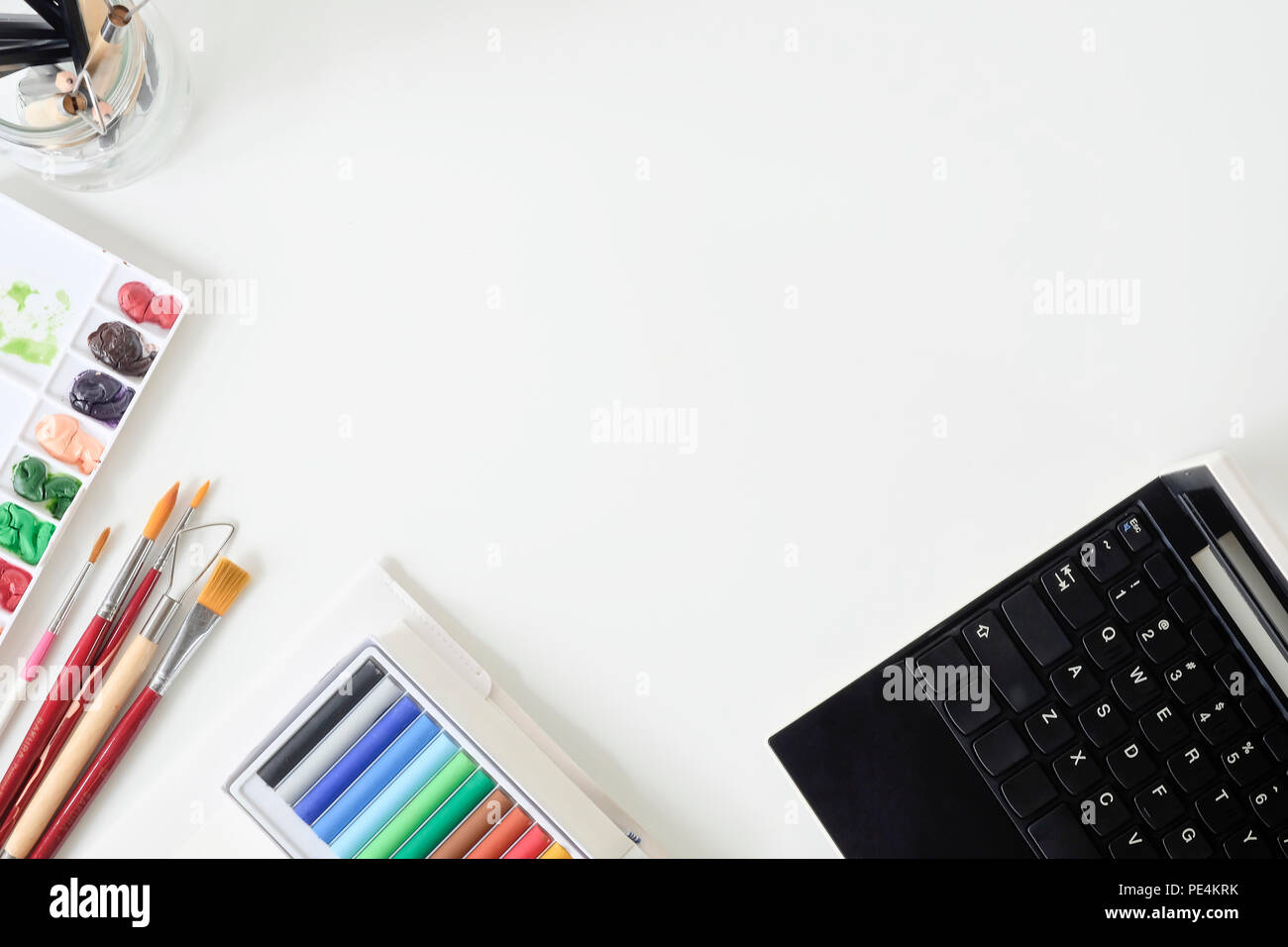 Top view office desk with artist table Stock Photo - Alamy