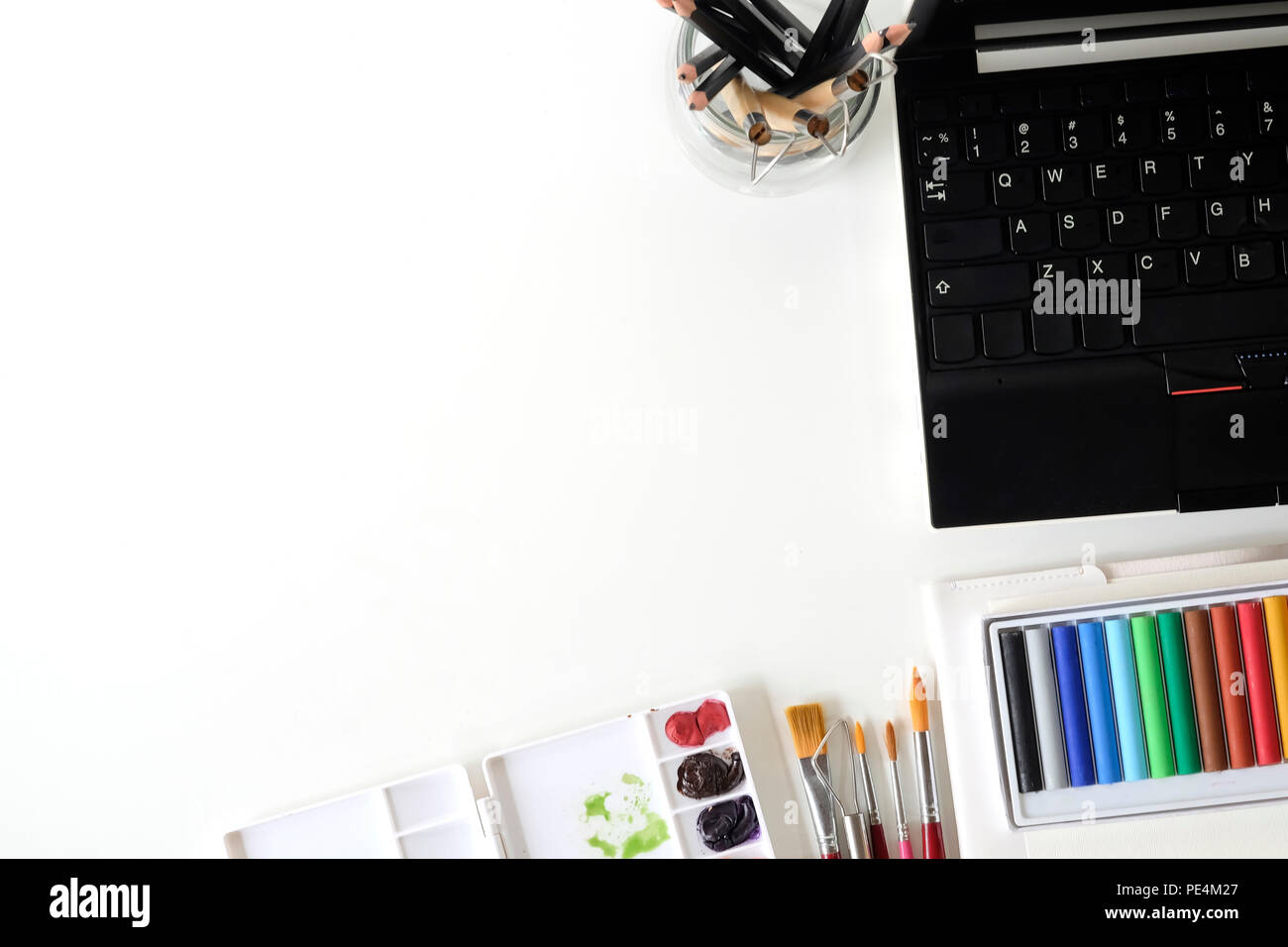 Top view office desk with artist table Stock Photo - Alamy