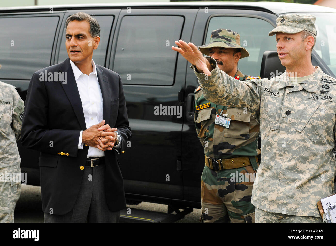 U.S. Ambassador to India Richard Verma (left), is briefed by Lt. Col ...