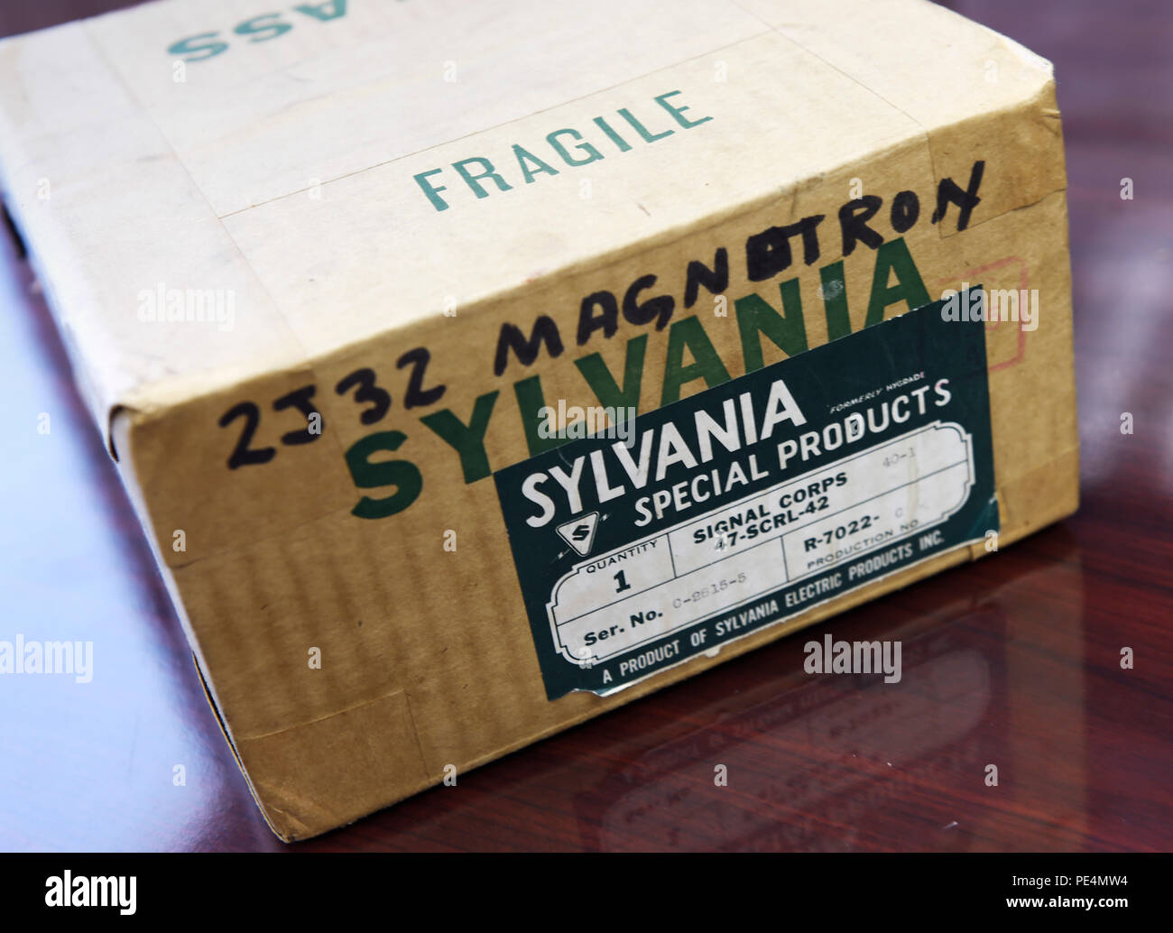 A World War II-era cavity magnetron, still in its original packaging ...