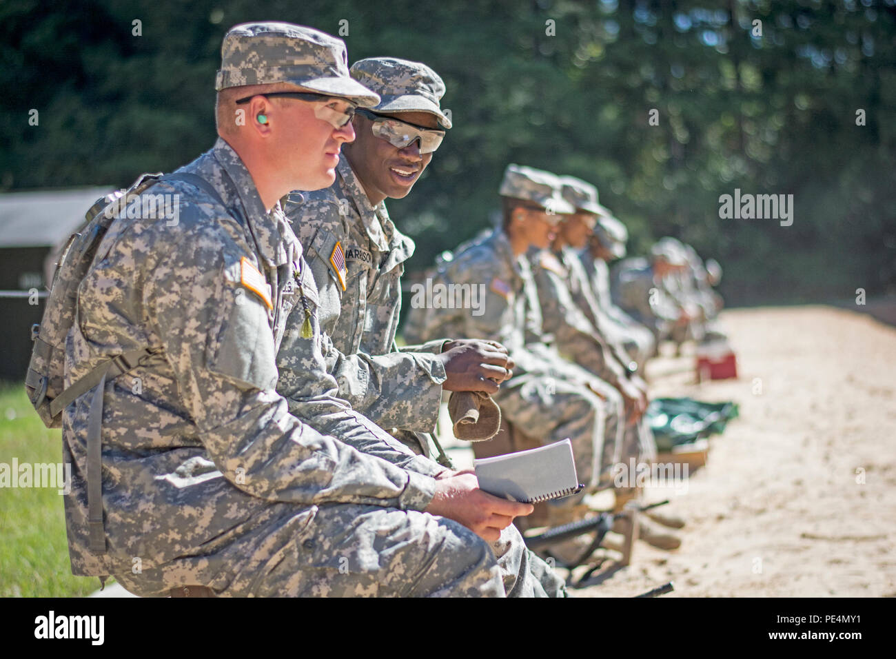 U.S. Army privates in basic training wait for thier turn to fire their ...