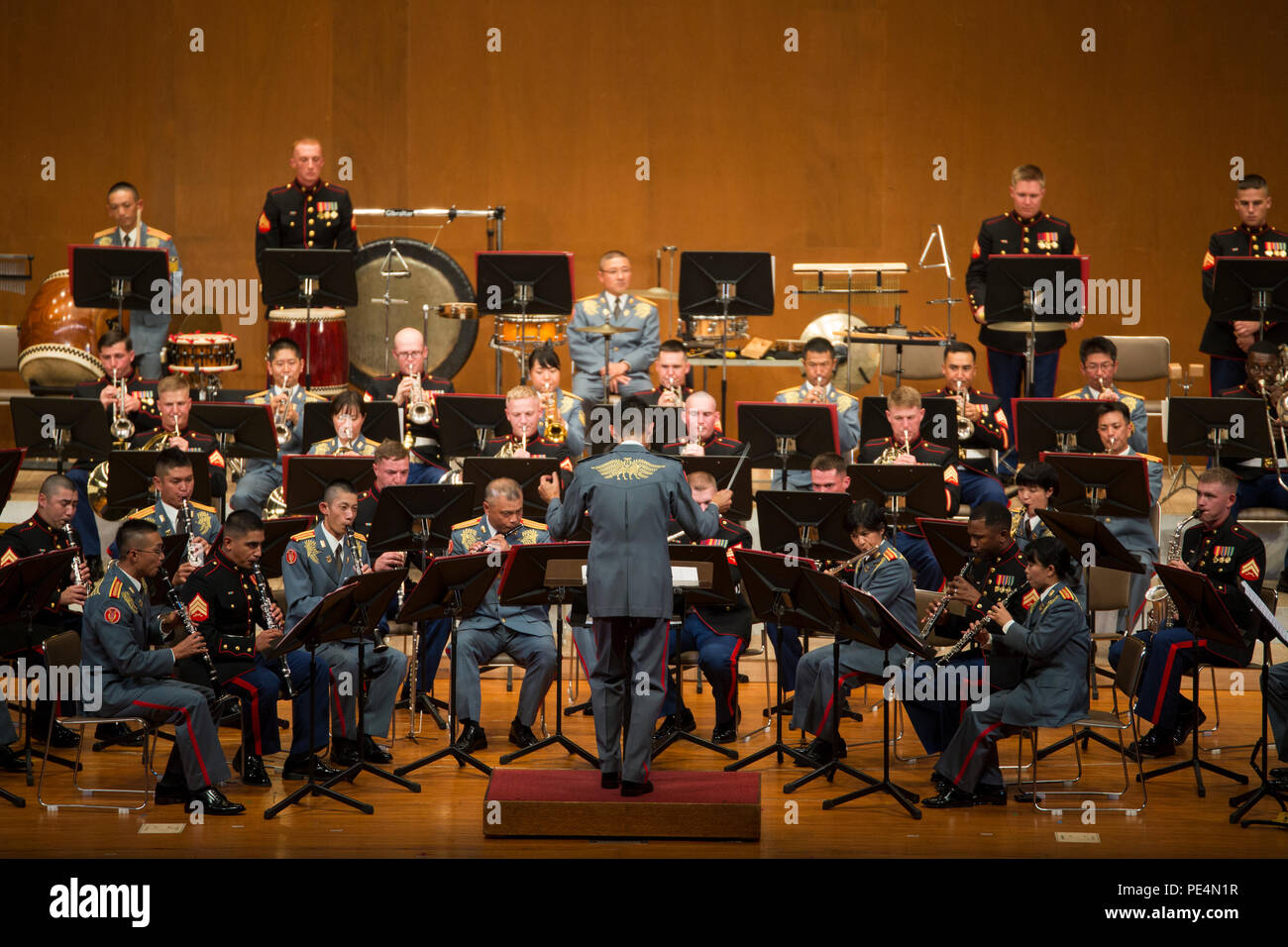 A combined band made up of the III Marine Expeditionary Force Band and ...