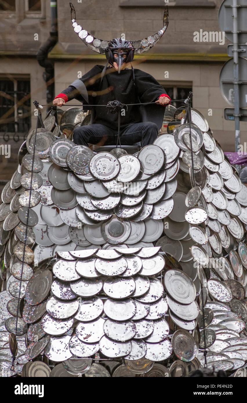Horned man driving a metallic float, Strasbourg carnival parade, Alsace ...