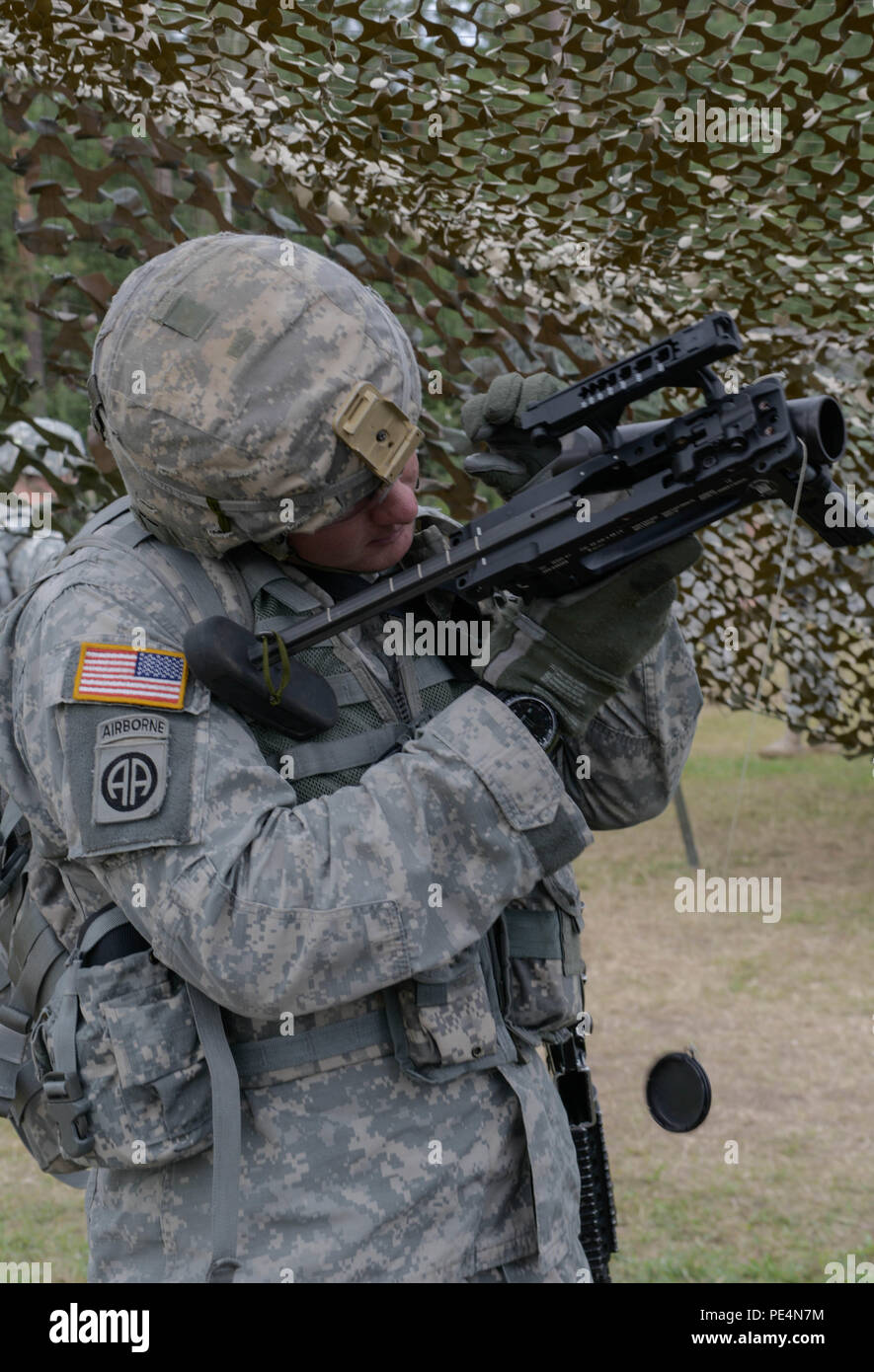 U.S. Troopers assigned to 2nd Cavalry Regiment, clear, load, and unload ...