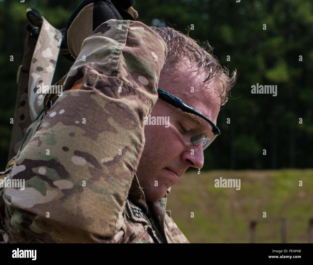 Sweat drips from the face of Sgt. Ben Mercer with the 416th Theater ...
