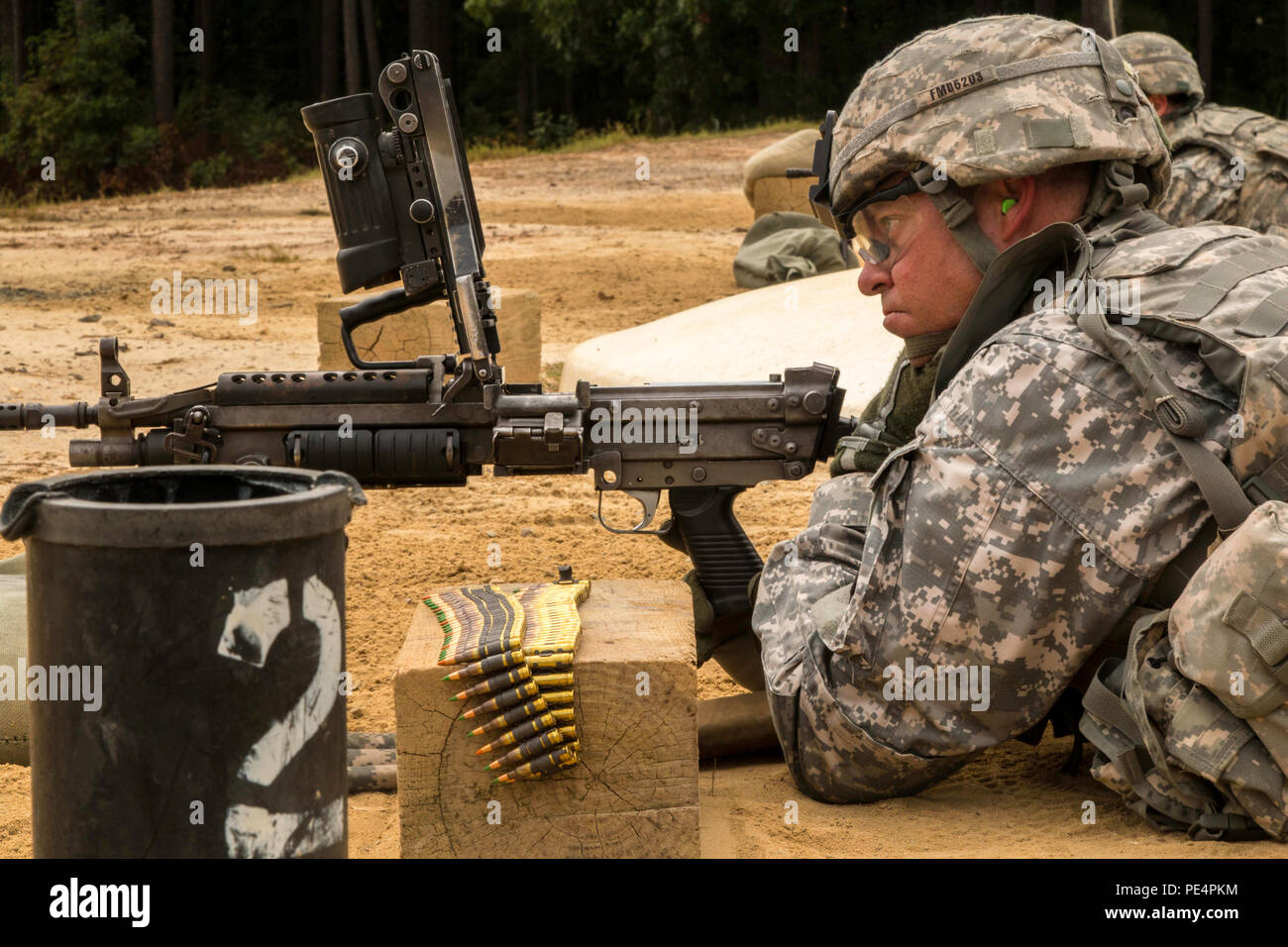 Captain Dustin Duncan, a UH-60 Blackhawk trainer, waits for the range ...
