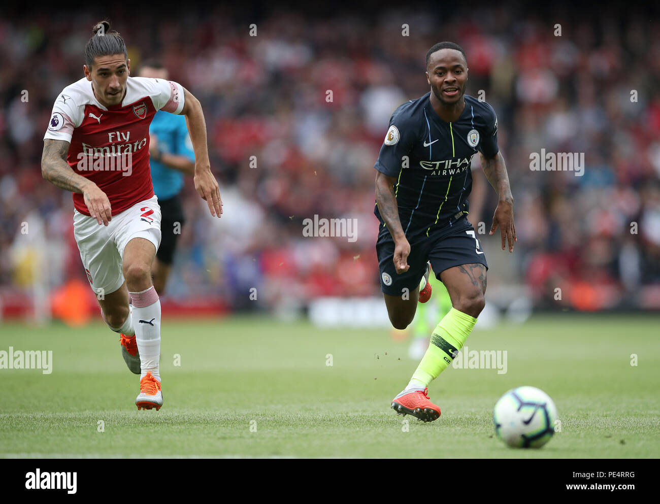 Arsenal's Hector Bellerin (left) and Manchester City's Raheem Sterling ...
