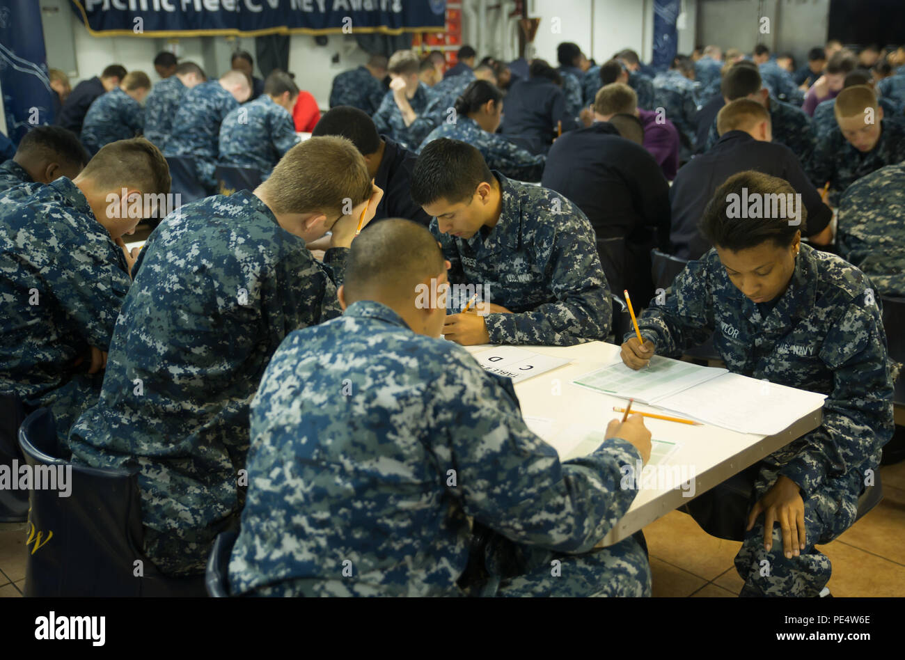 150917-N-EH855-024 PACIFIC OCEAN (Sept. 17, 2015) Sailors answer ...