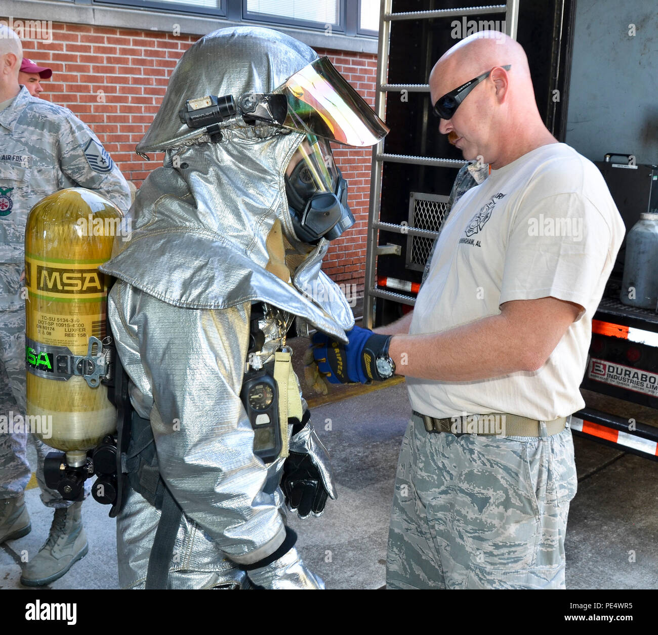 Firefighters from the Civil Engineering Squadron practice fighting ...