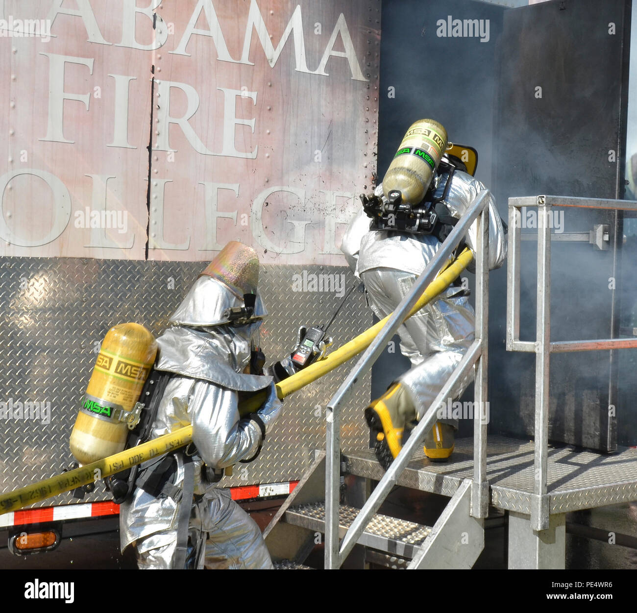 Firefighters from the Civil Engineering Squadron practice fighting ...