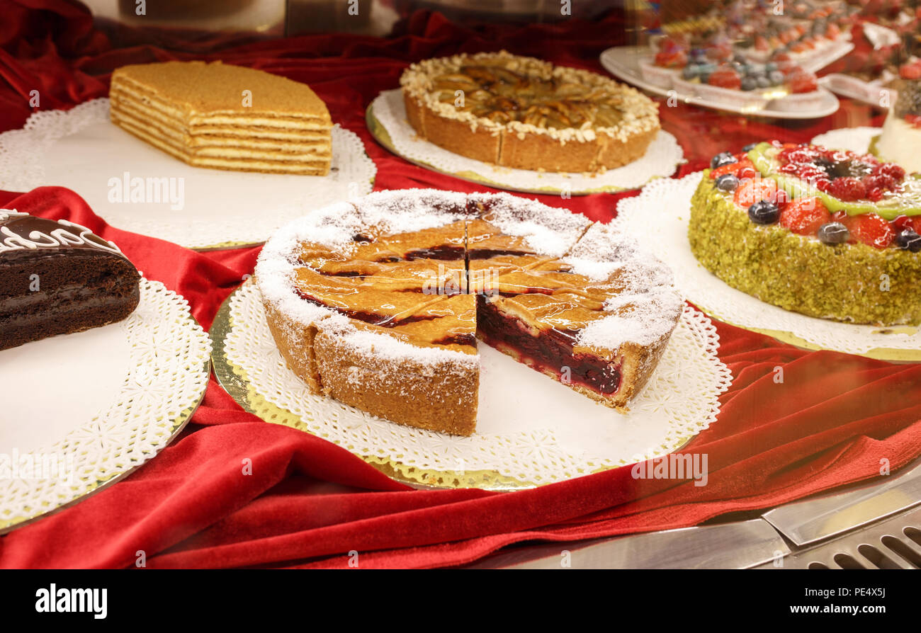 Cafe with a display of different cakes hi-res stock photography and ...