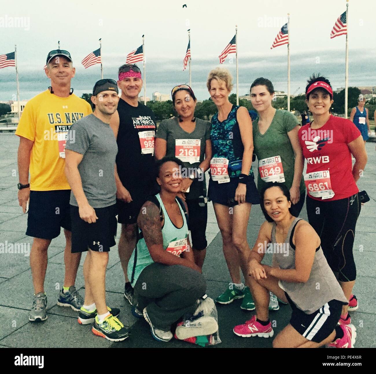 Pictured from left to right, (standing), NMLC Executive Officer Cmdr ...