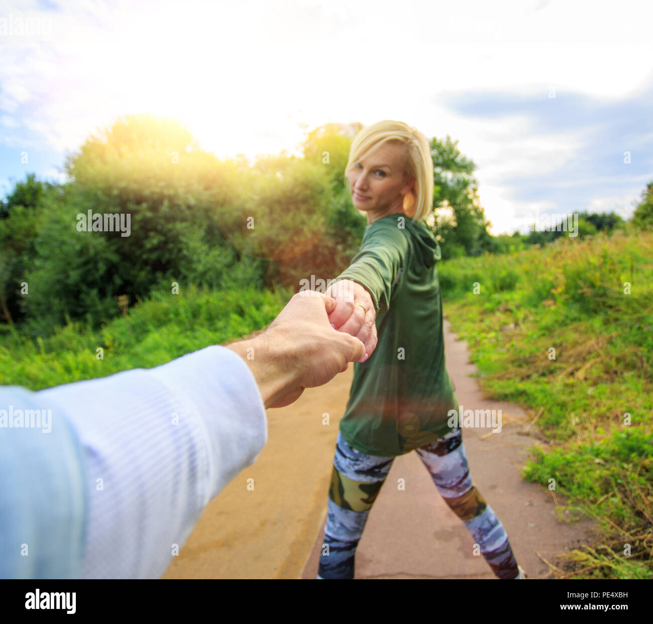 Help Concept Hands reaching out to help each other with light f Stock ...