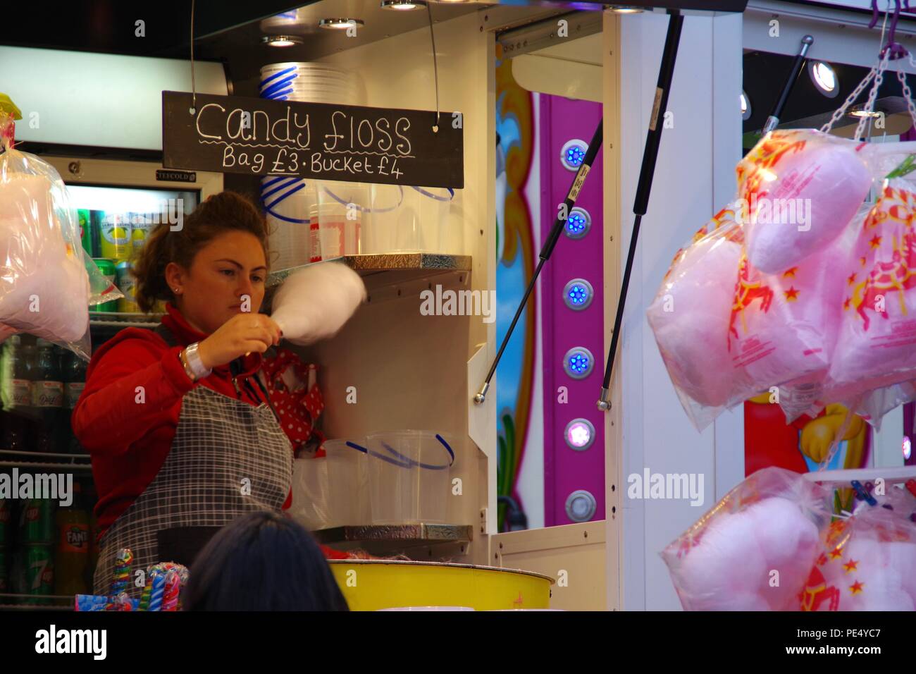 Young Woman Spinning Candy Floss at a Snack Van. Bristol Balloon Fiesta ...