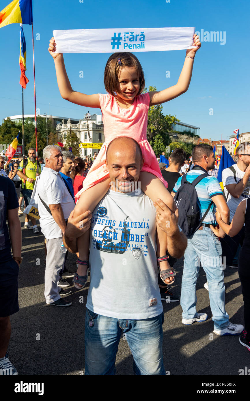 Bucharest, Romania - 10 August 2018: Father and daughter with other ...