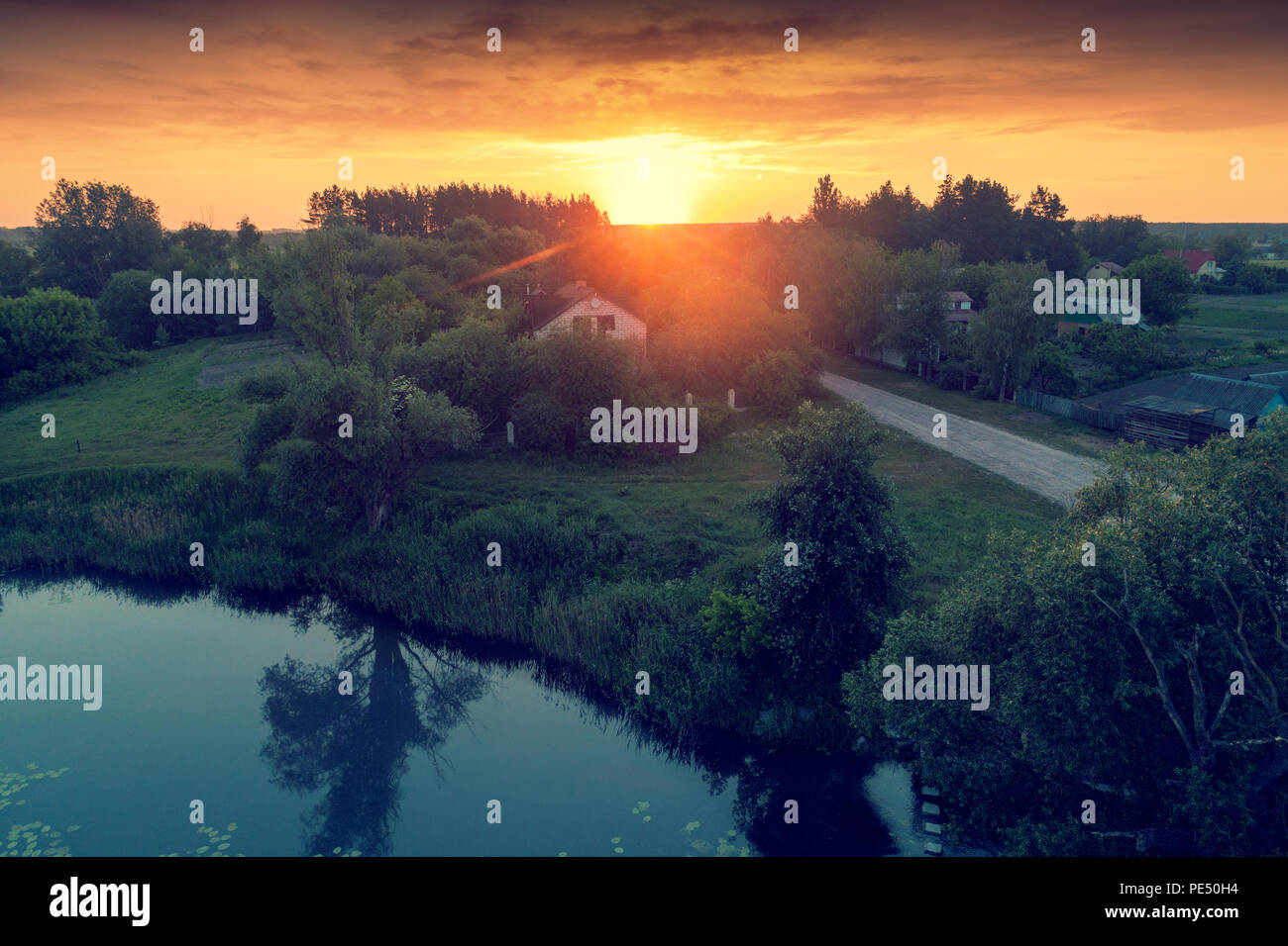 Beautiful lake village in evening hi-res stock photography and images ...
