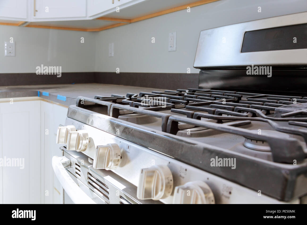 NEW gas stove close up Gas Cooker Installation Gas Appliance Repair in ...