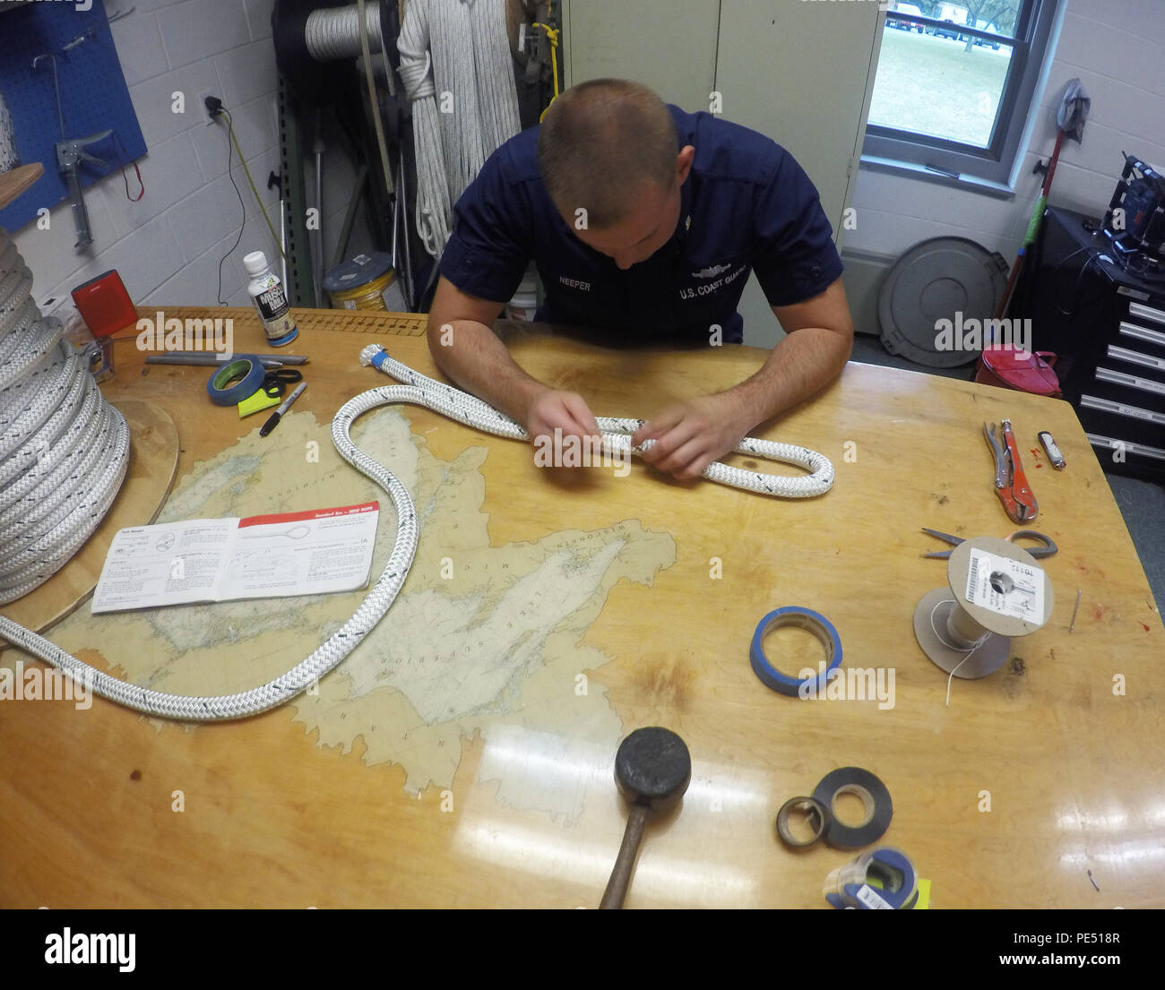 Petty Officer 2nd Class Brock Taylor, a member of Coast Guard Station ...