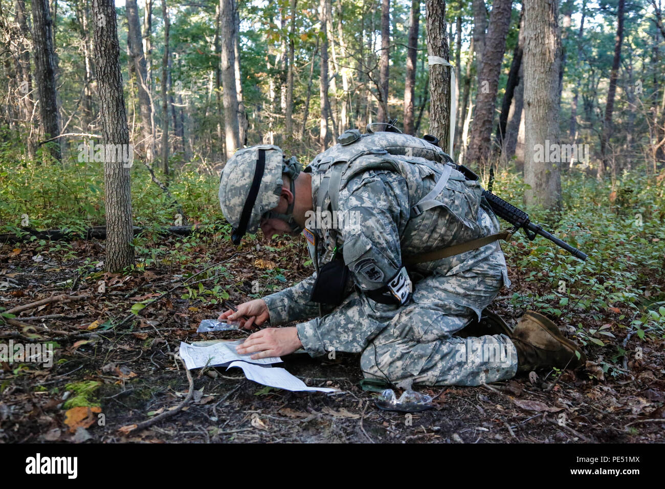U.S. Army Spc. Travis Shooks, assigned to 517th Geospatial Engineer ...