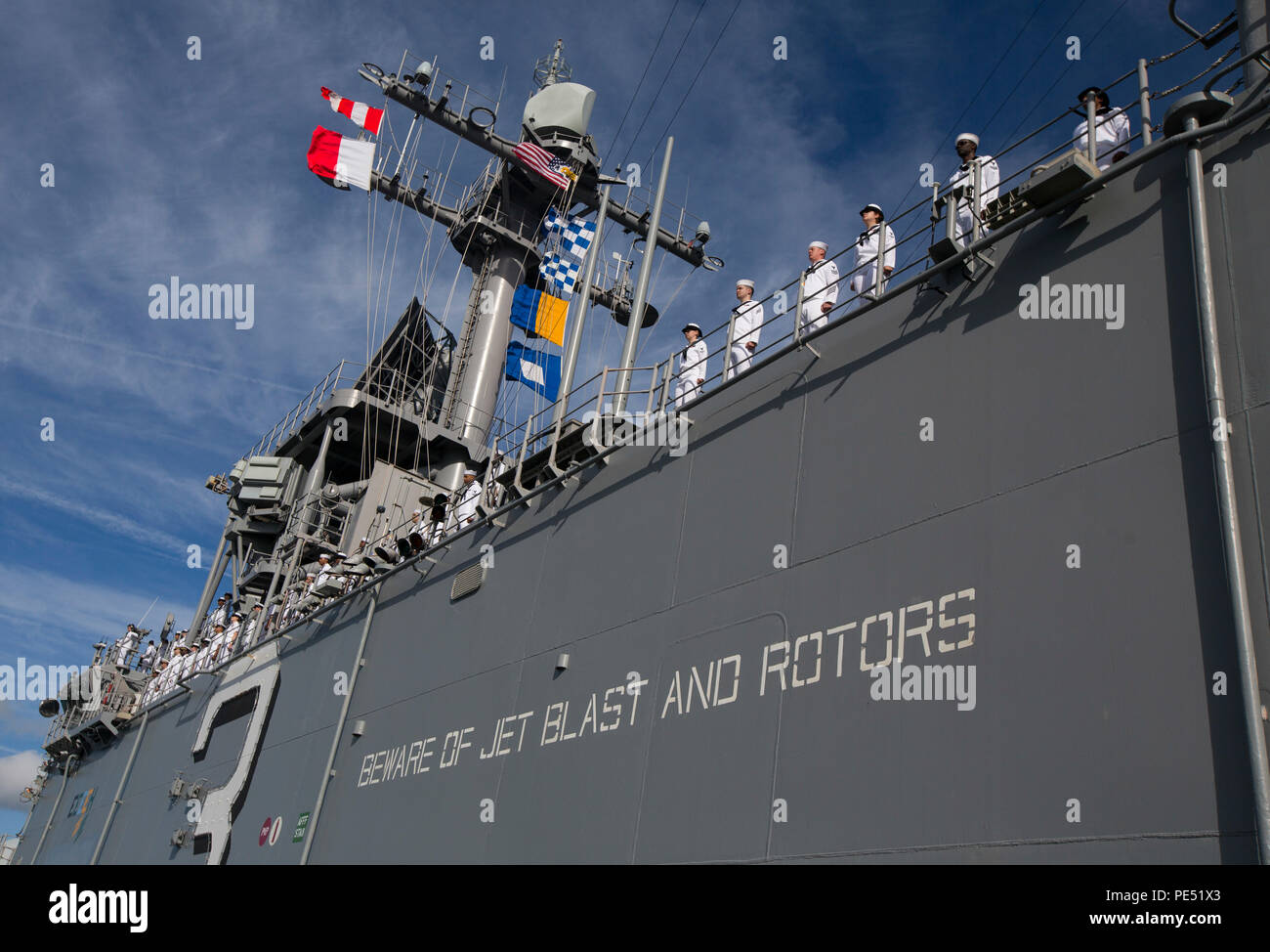 U.S. Navy Sailors with Amphibious Squadron (PHIBRON) 4, man the rails ...