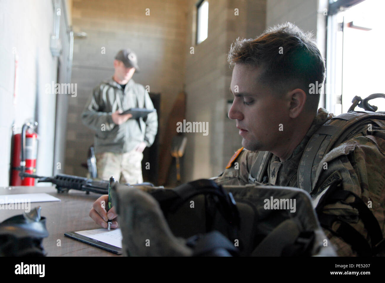 U.S. Army Sgt. Justin McLendon, assigned to 10th Mountain Division ...