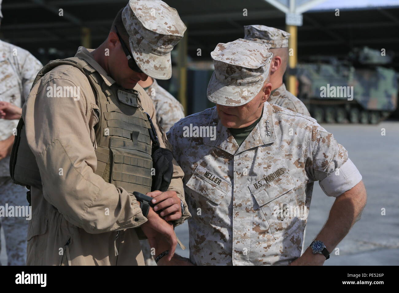 Commandant of the Marine Corps Gen. Robert B. Neller talks to 1st Lt ...