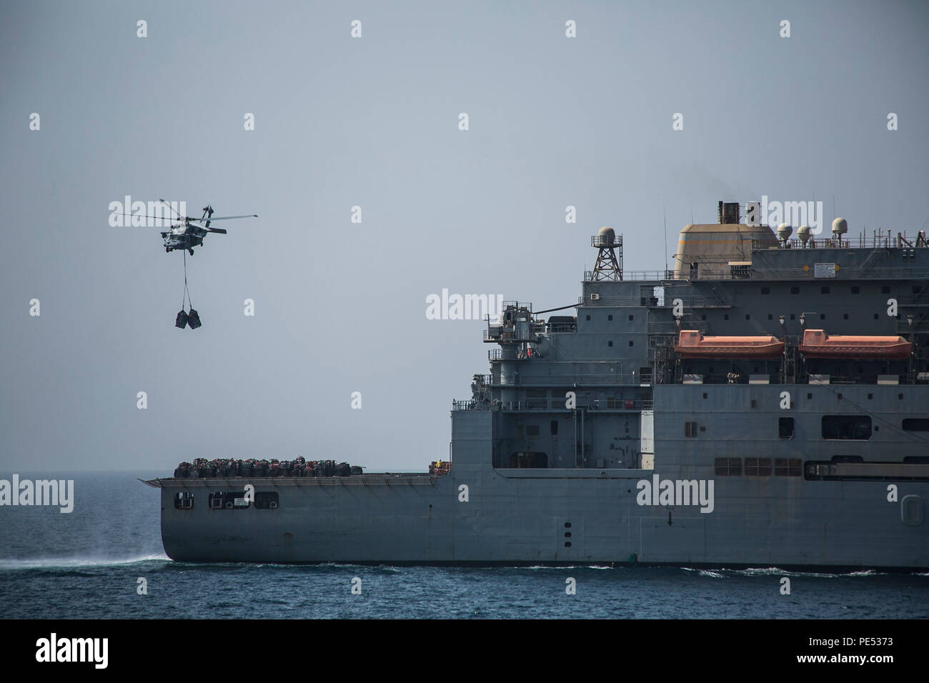 ARABIAN GULF (Oct. 7, 2015) An MH-60S Sea Hawk transports pallets from ...