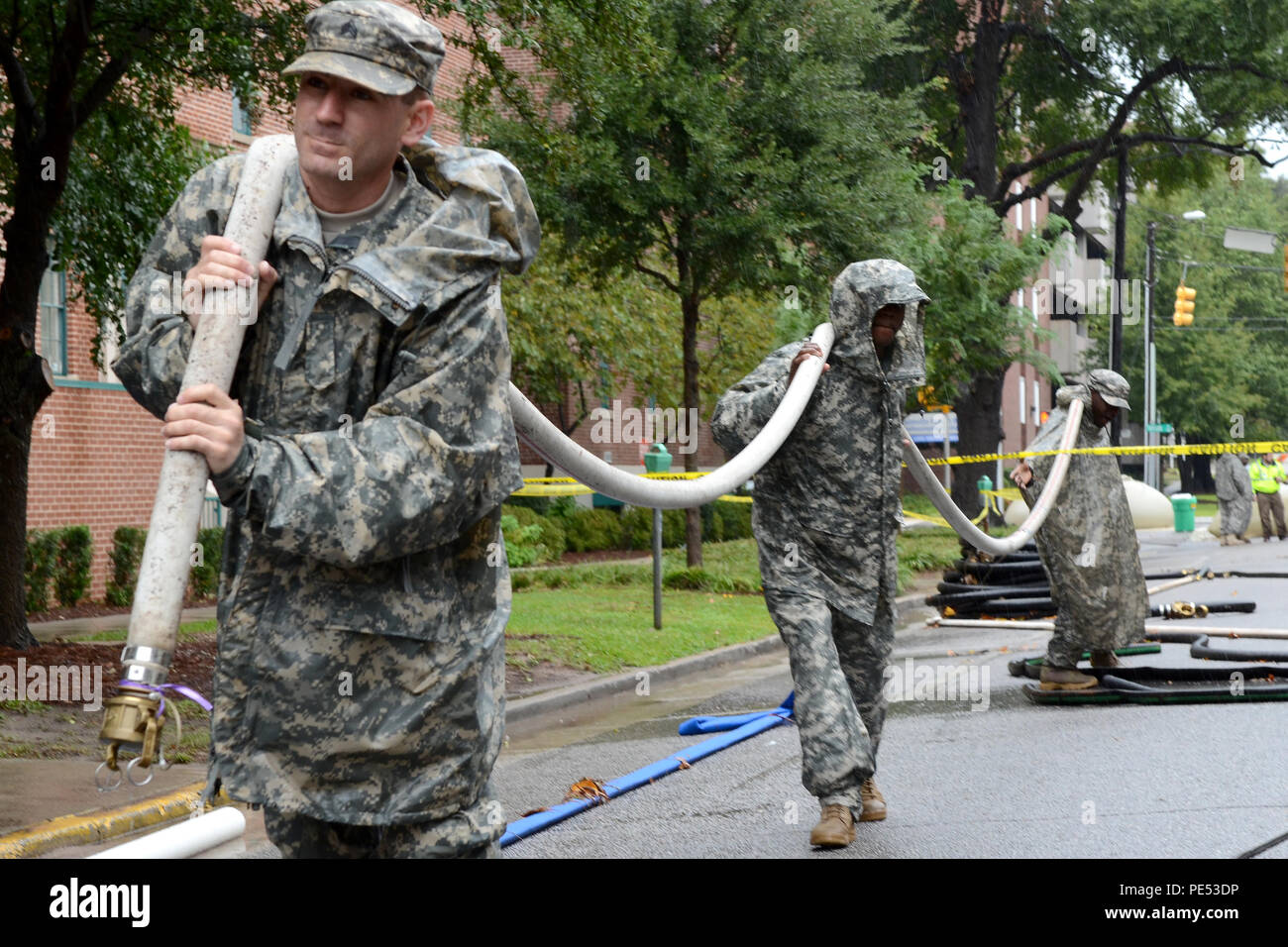 U.S. Army Sgt. James Rowe, Spc. Louis Searles and Sgt. Dejaun Palmer ...
