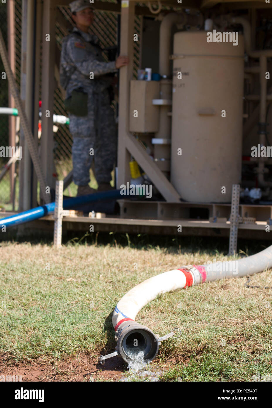 Spc. Vinci Valerie Genuino, a water purification specialist with the ...