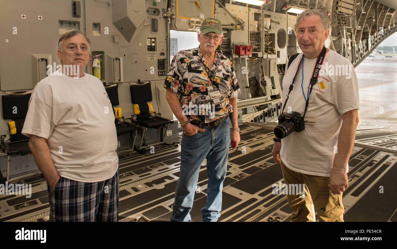 (From left to right) During a Vietnam War veterans base tour, Larry ...