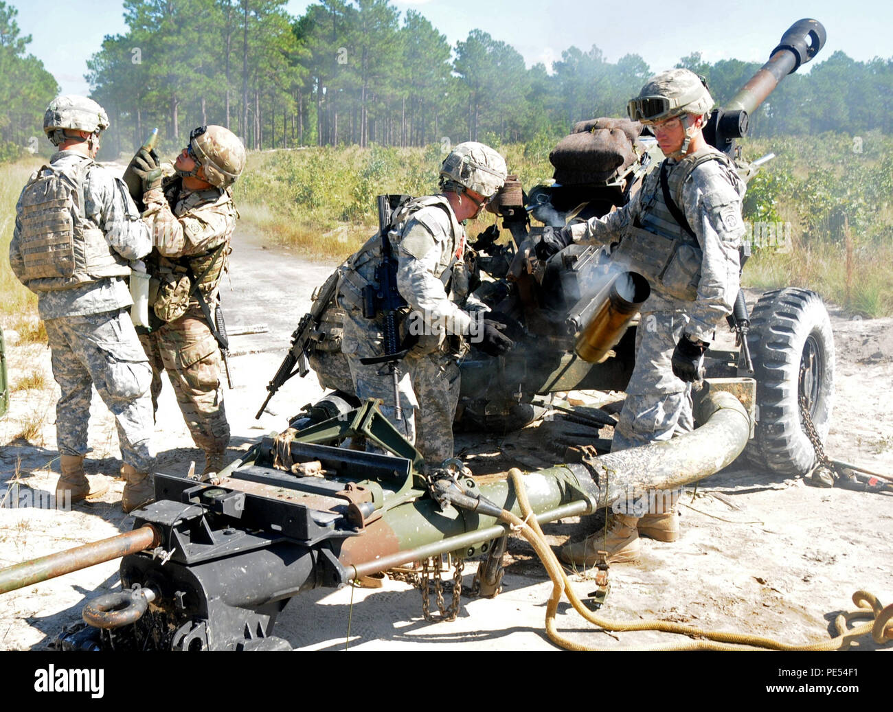 A crew from 1st Battalion, 319th Airborne Field Artillery Regiment ...