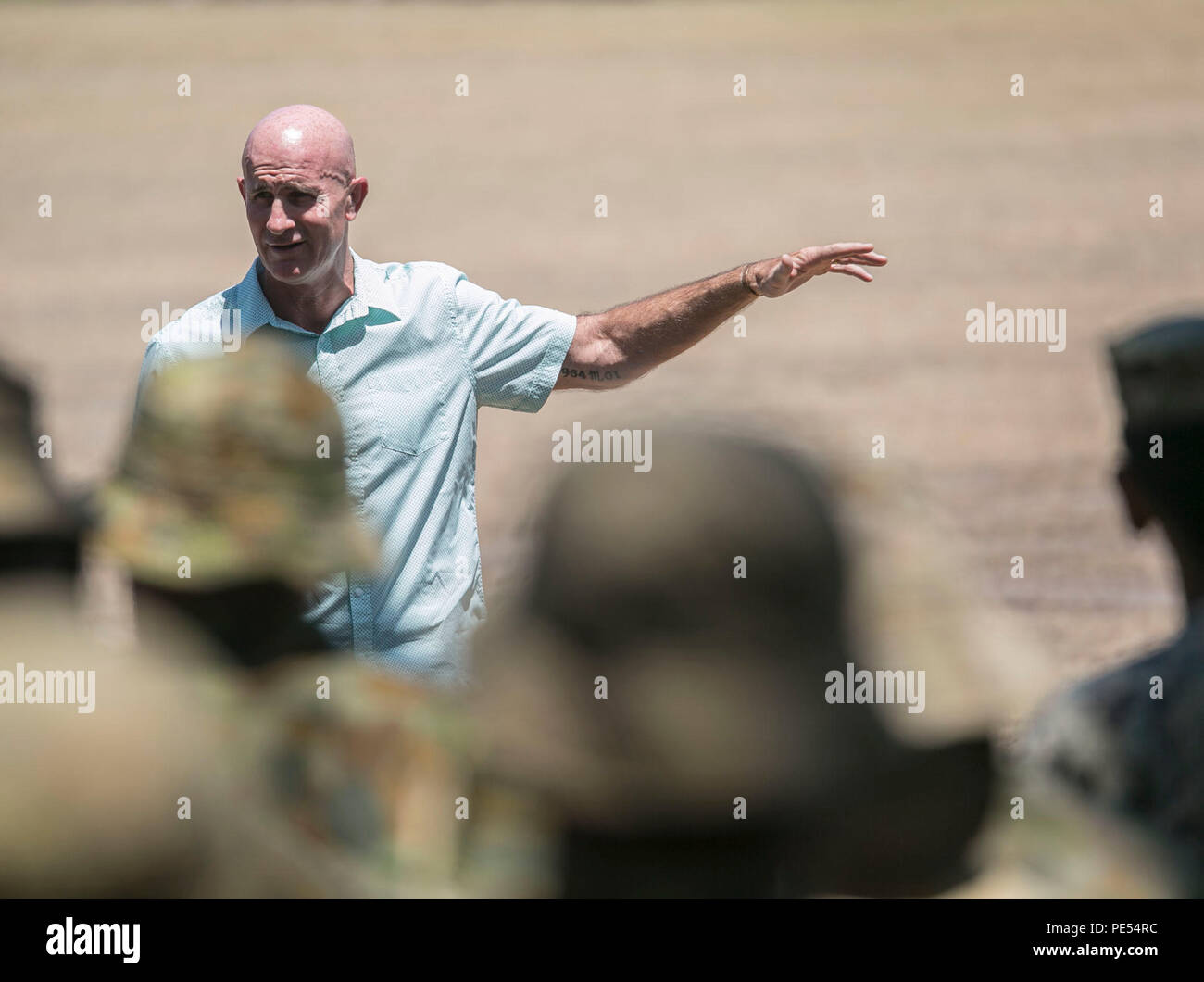 Royal Australian Army Warrant Officer 1 David Lehr commends the Puk Puk ...