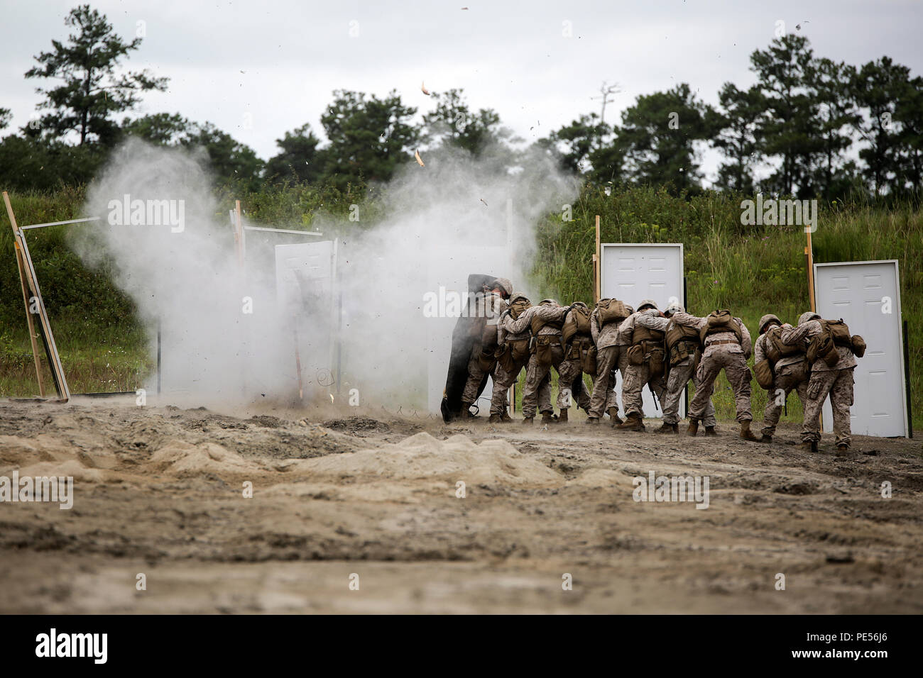 Marines with 2nd Battalion, 2nd Marine Regiment stand behind a ...