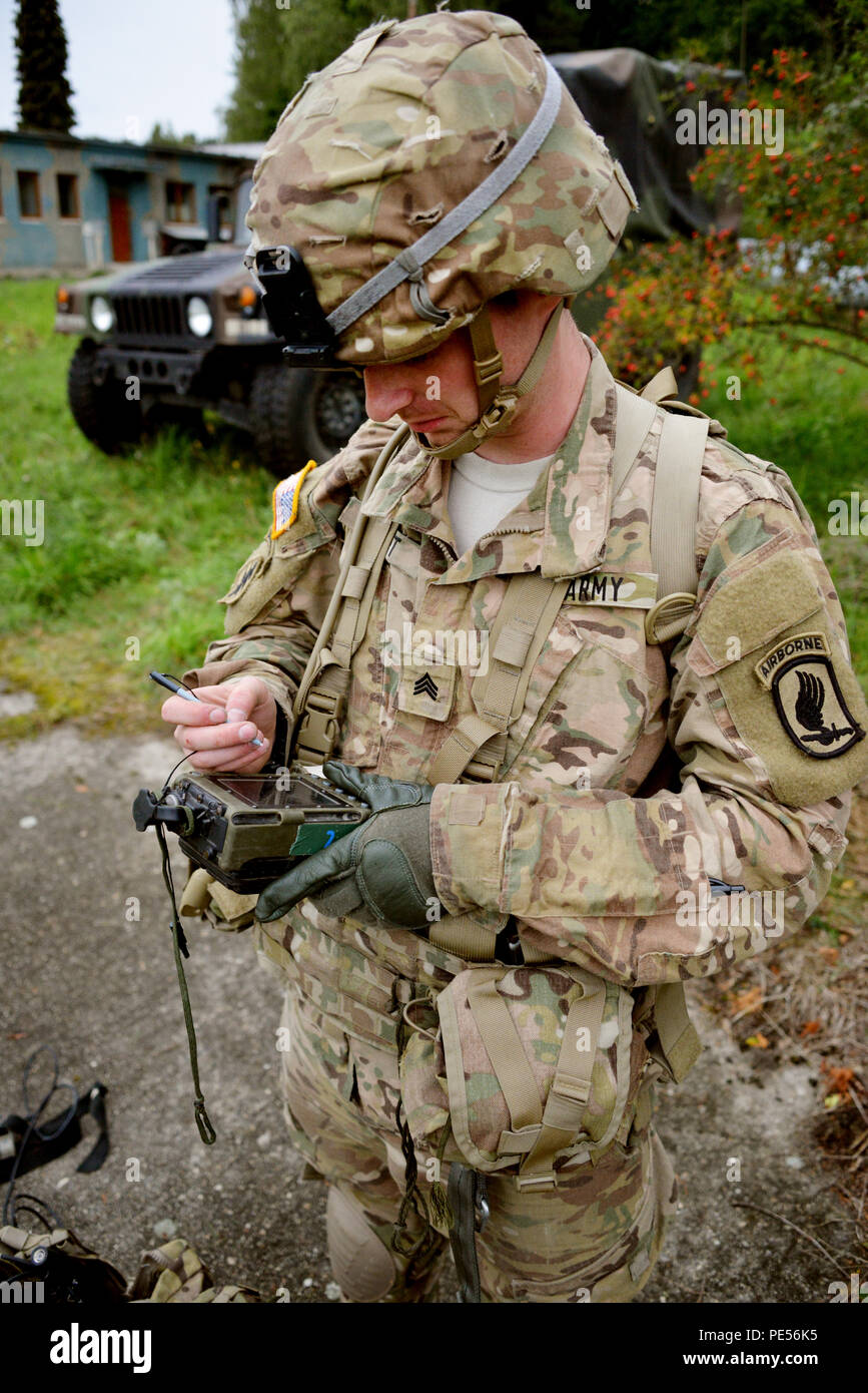 U.S. Army Sgt. Michael Praet, a paratrooper assigned to 1st Squadron ...