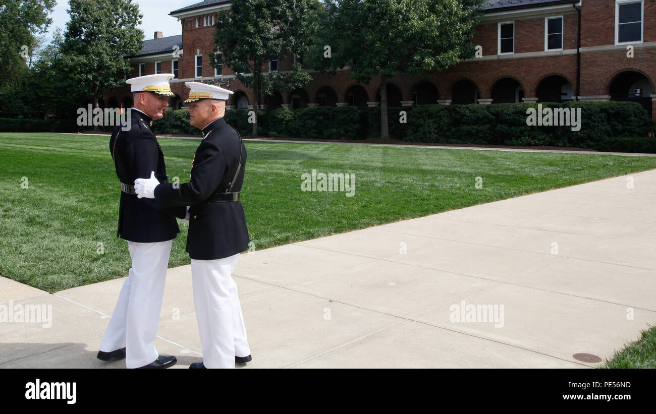 Gen. Robert B. Neller, right, and Joseph F. Dunford Jr. shake hands ...