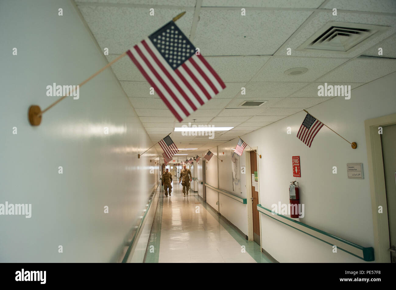 U.S. Air Force Tech. Sgt. Scott Hatch, left, and Maj. Thomas Naughton ...