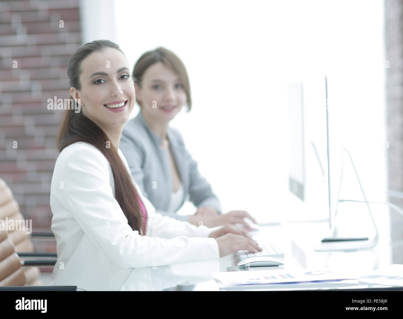 employee of the company working at their workplace Stock Photo - Alamy