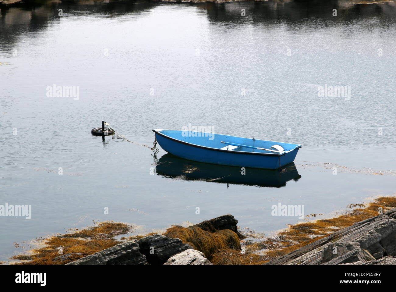 Boats look great when they are.painted blue Stock Photo - Alamy