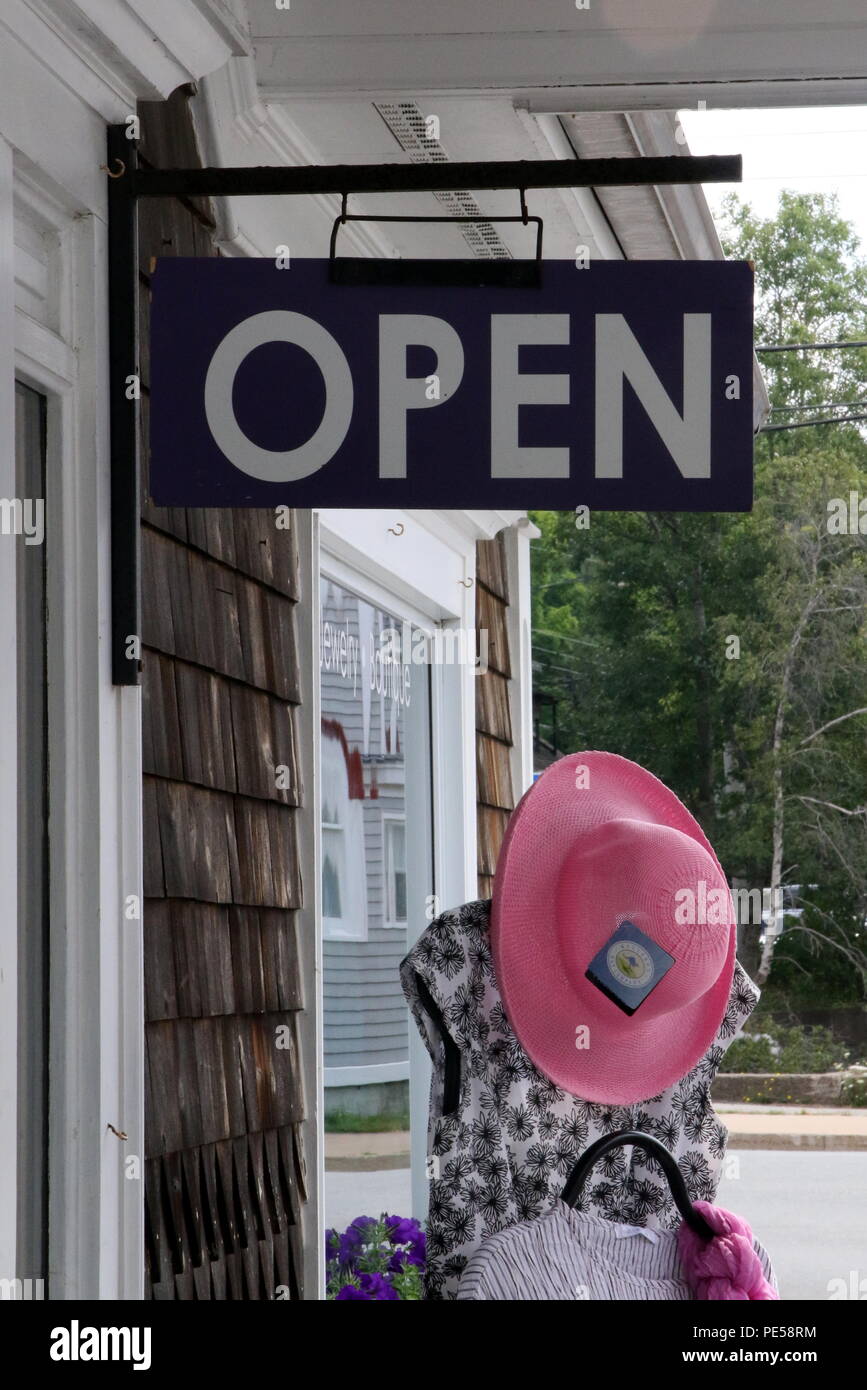 This lady's clothing store is open Stock Photo - Alamy