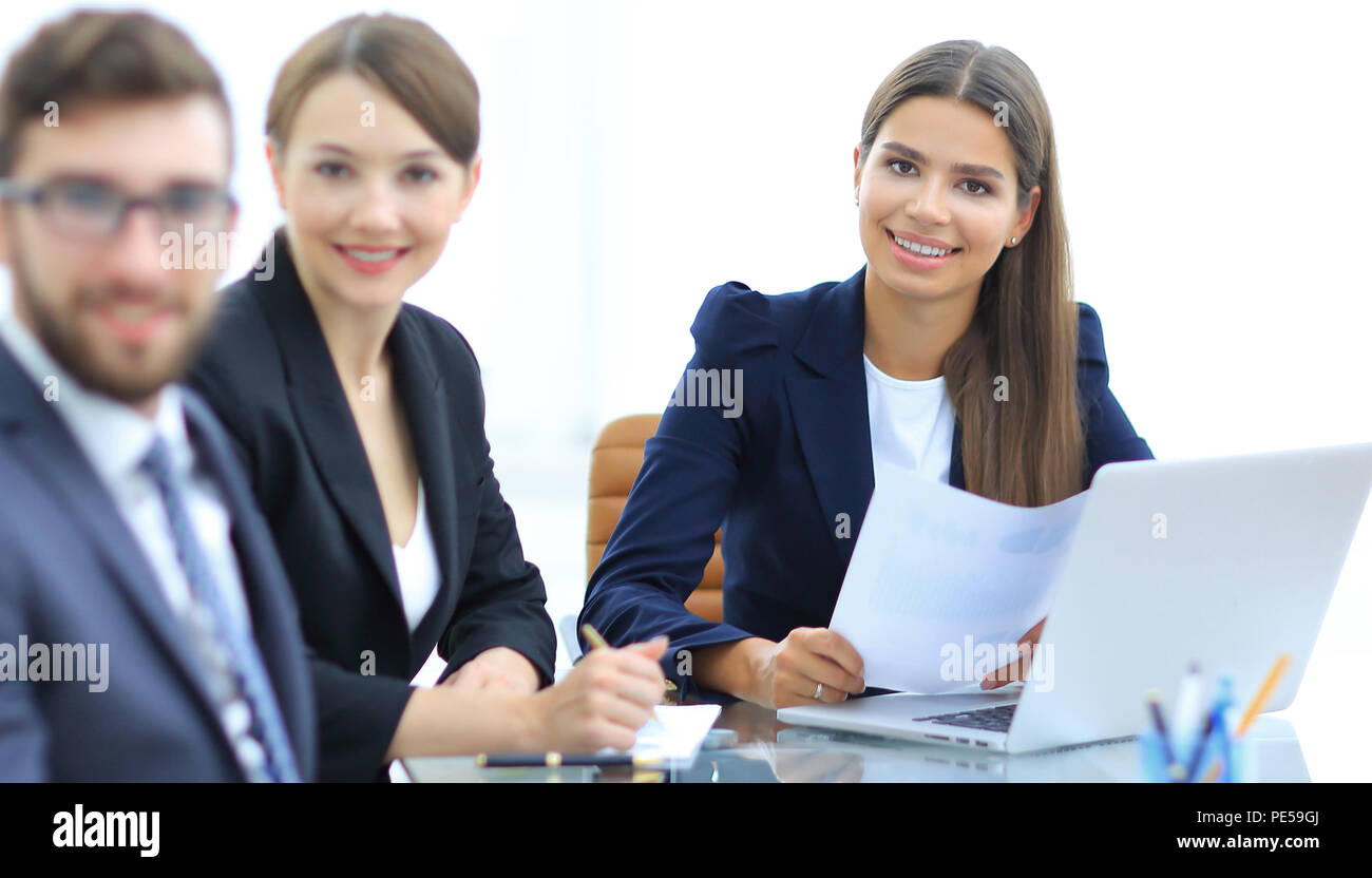 employees sitting behind a Desk Stock Photo - Alamy
