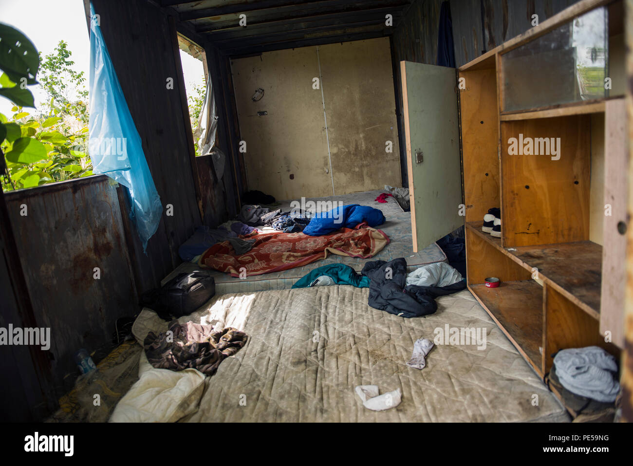 A view of a bedroom inside a hangar next to the refugee camp. Refugees ...